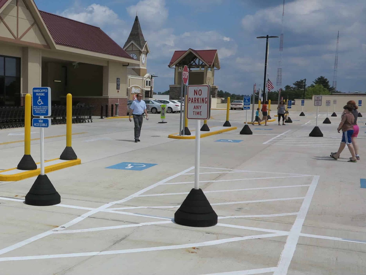 Choosing the Right Materials for Sign Bases: Concrete vs. Recycled Rubber